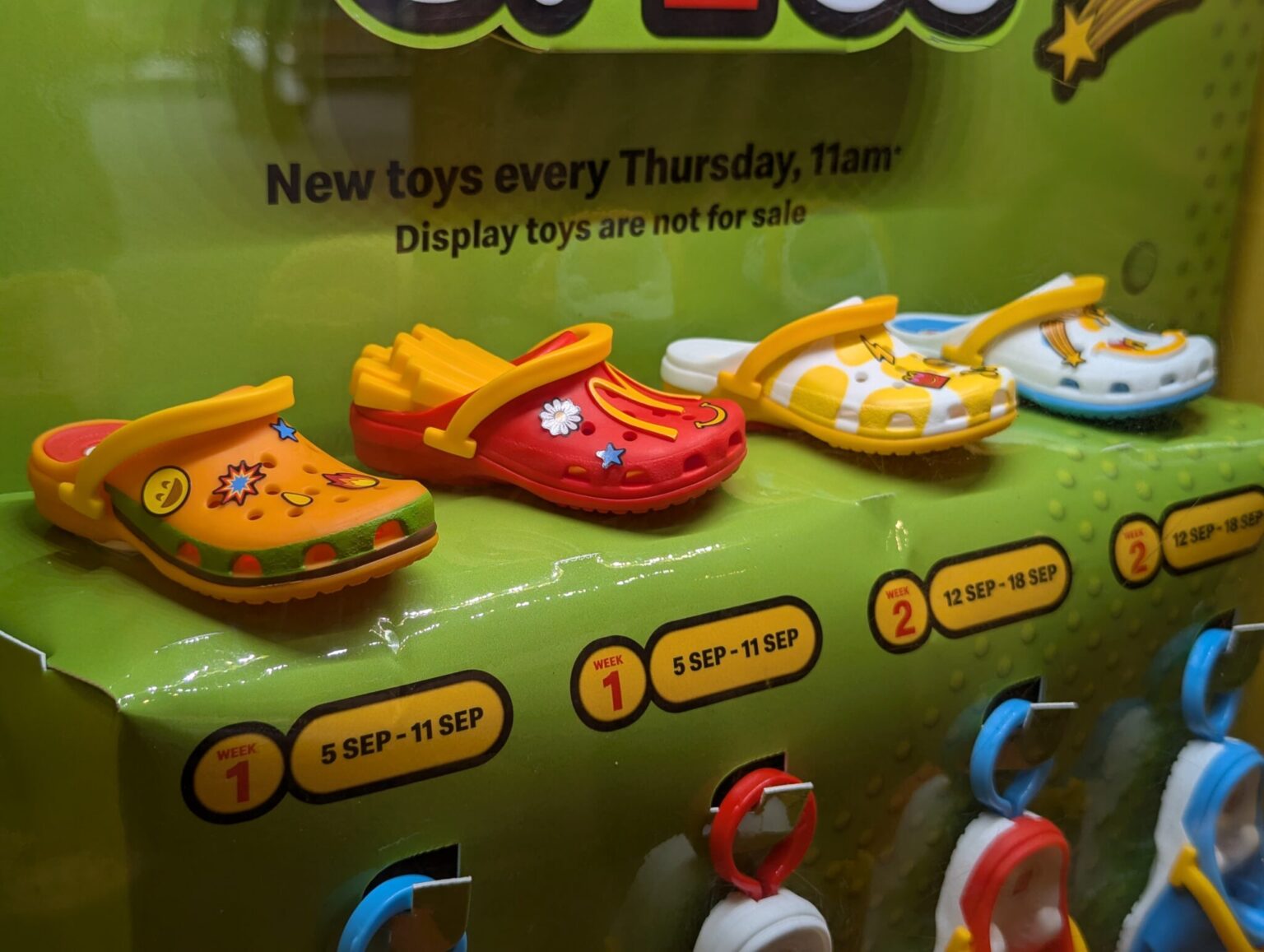Latest McDonald's Happy Meal Toys are Tiny Crocs Clips, even has one ...